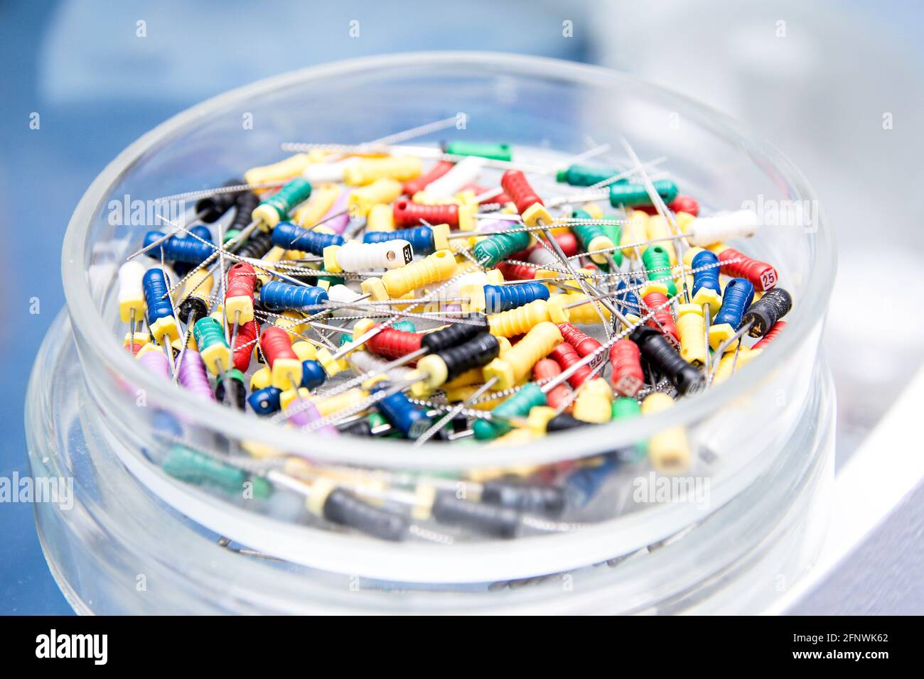 Dental tools in the glass round box. Dental instruments - k-files ...