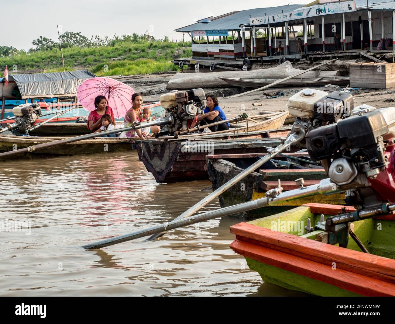 Santa Rosa, Peru - Sep 2017; Wooden boats in the port in tropical zone ...