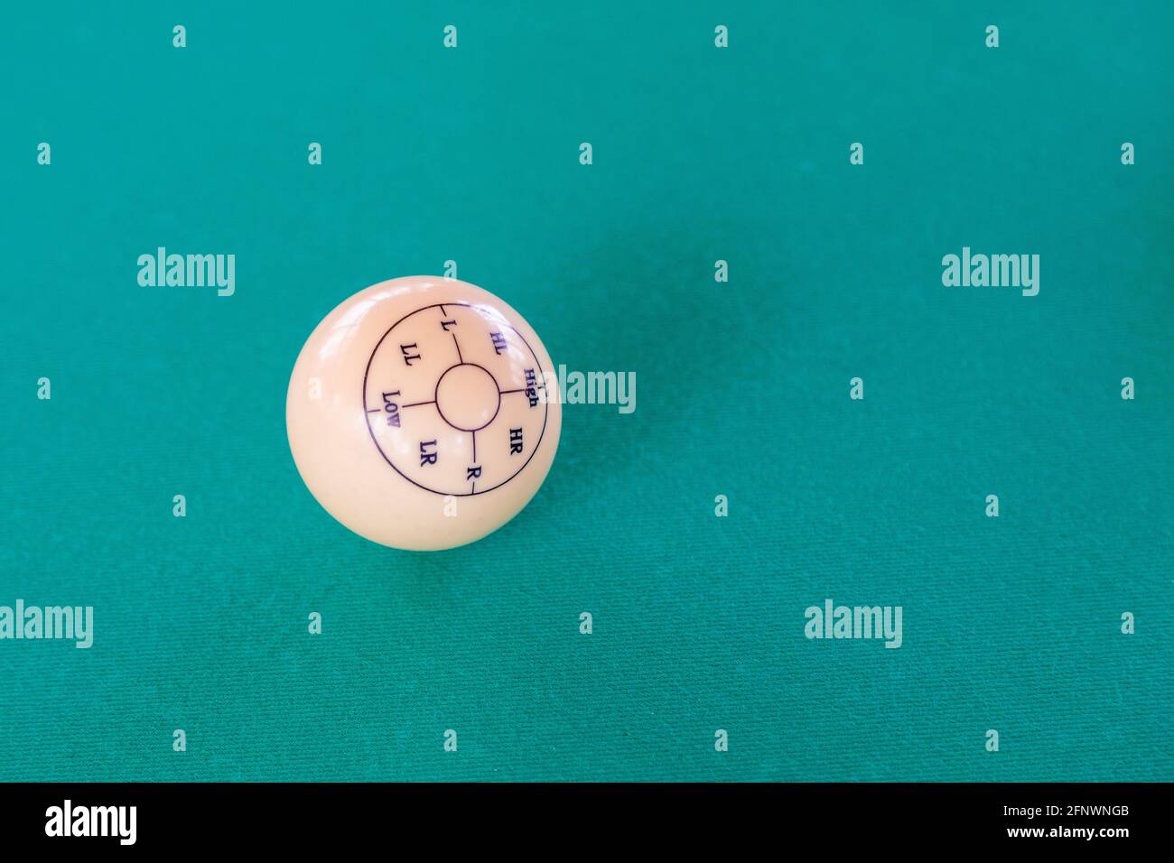 Ivory billiard ball. Impact direction marking. Close-up Stock Photo - Alamy