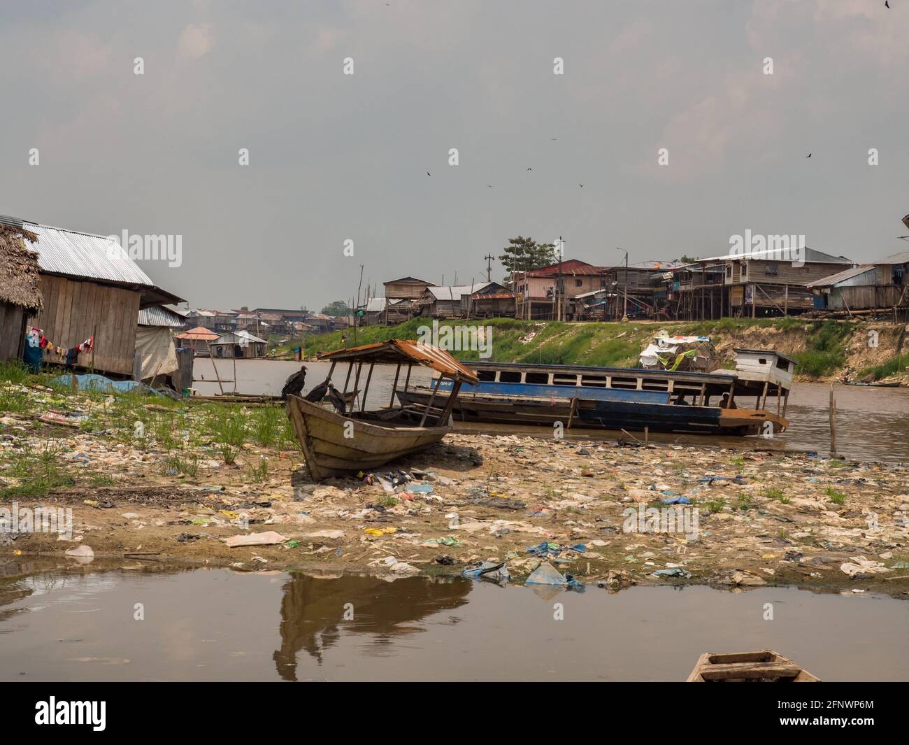 Belen,Iquitos, Peru - March 27, 2018: Wooden boat between huge ...