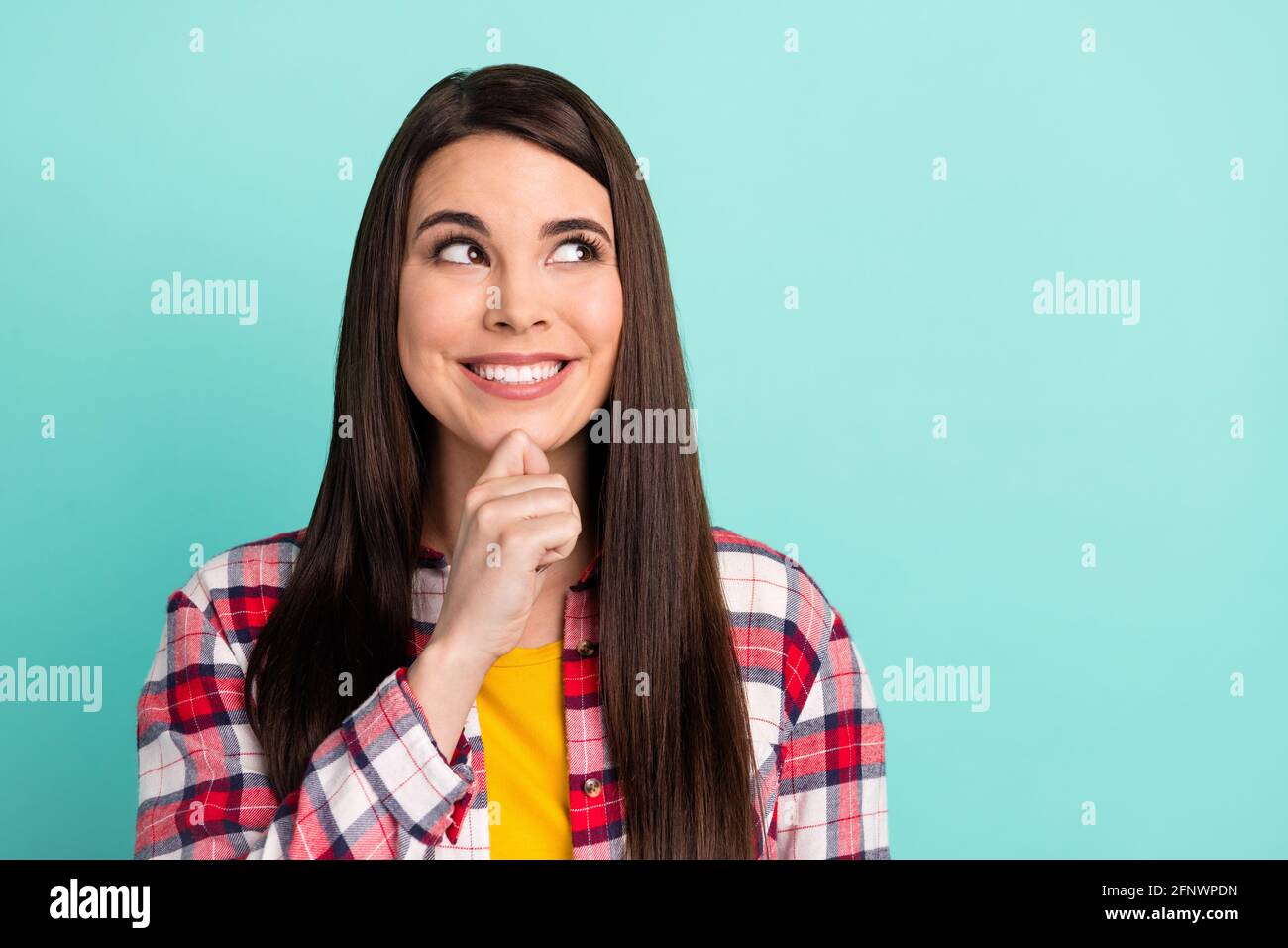 Photo of dreamy minded young lady hold hand chin look empty space ...