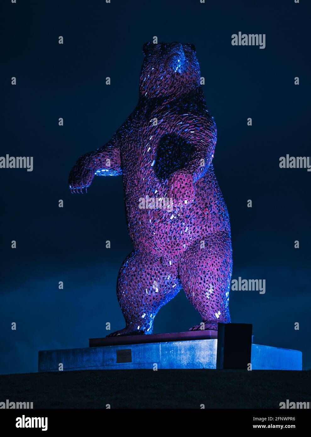 Giant steel bear sculpture, Dunbear by sculptor Andy Scott, lit up at ...