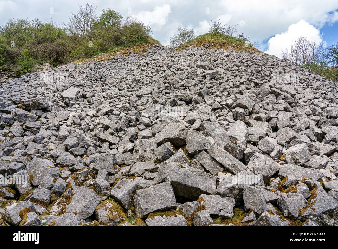 Upper reaches of Lathkill Dale in the Derbyshire Peak District UK with ...