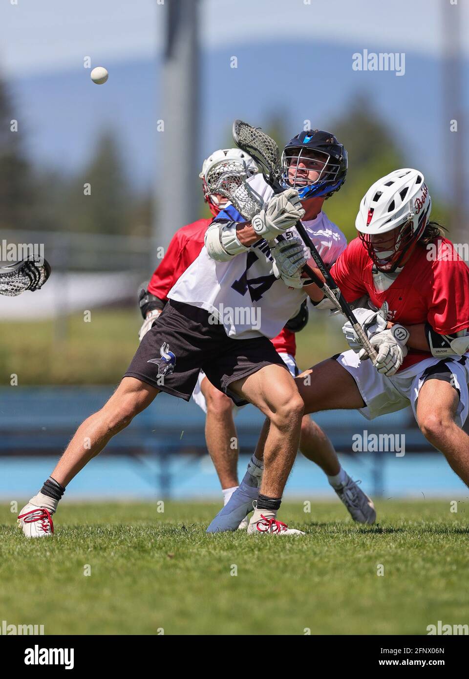 High School lacrosse action with Boise vs Coeur d'Alene High School in Coeur d'Alene, Idaho ...