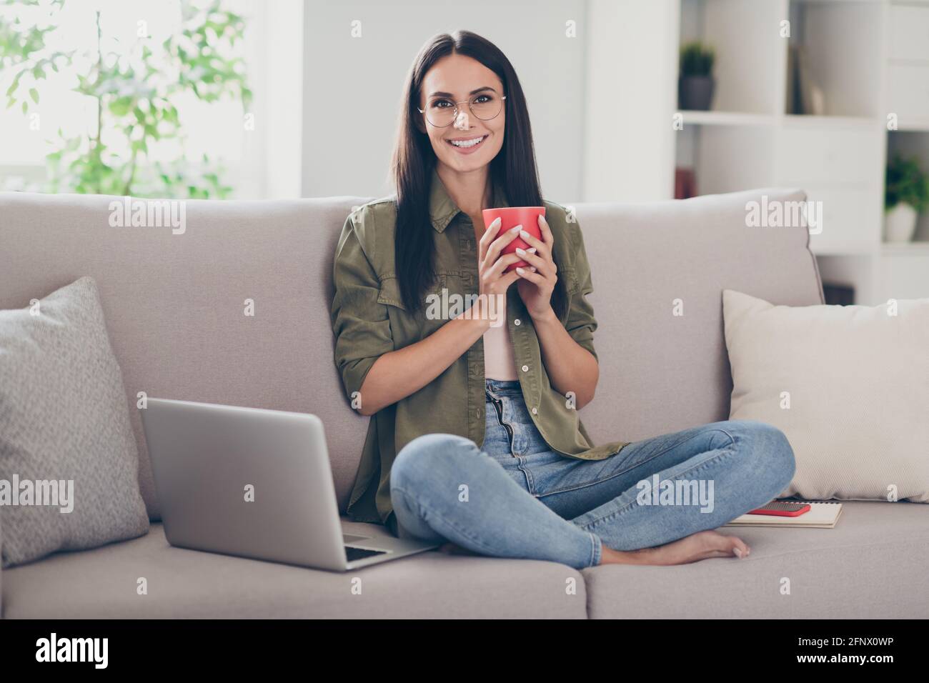 Full length photo of young cheerful woman happy positive smile sit ...