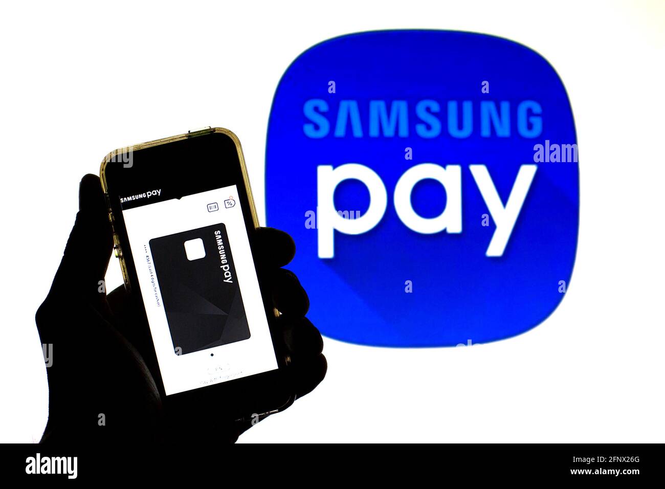In this photo illustration a Samsung Pay app seen displayed on a ...