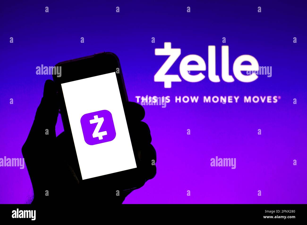 In this photo illustration a Zelle app seen displayed on a smartphone ...
