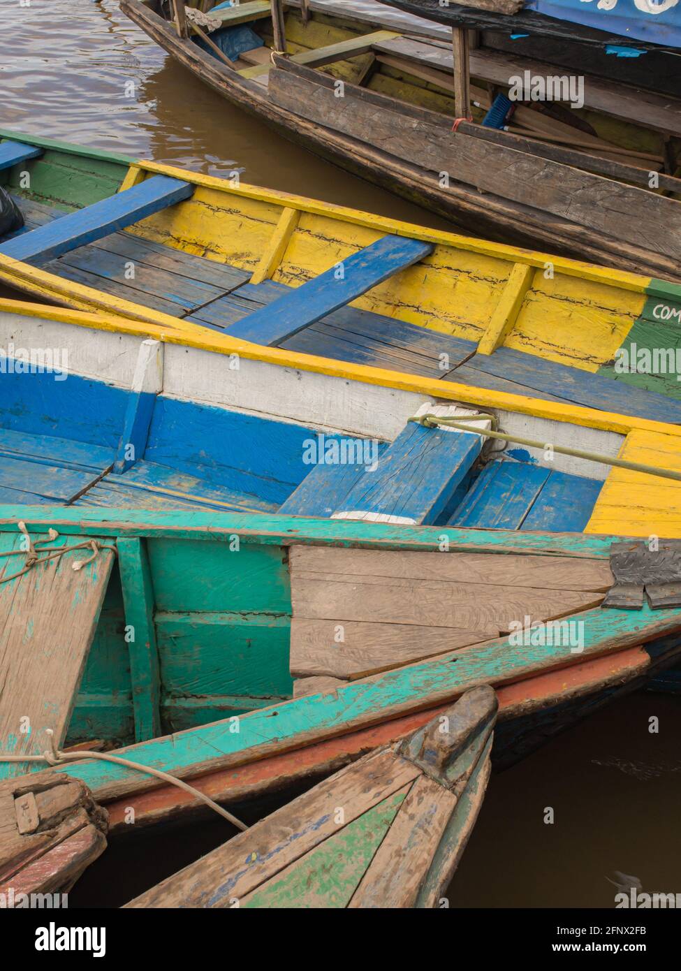 Leticia, Peru - May 11, 2016: Traditional, indian boats on the bank of ...
