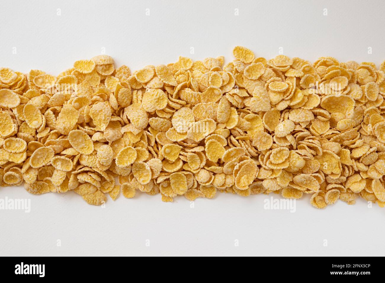 corn flakes background, frame of cornflakes isolated on white ...