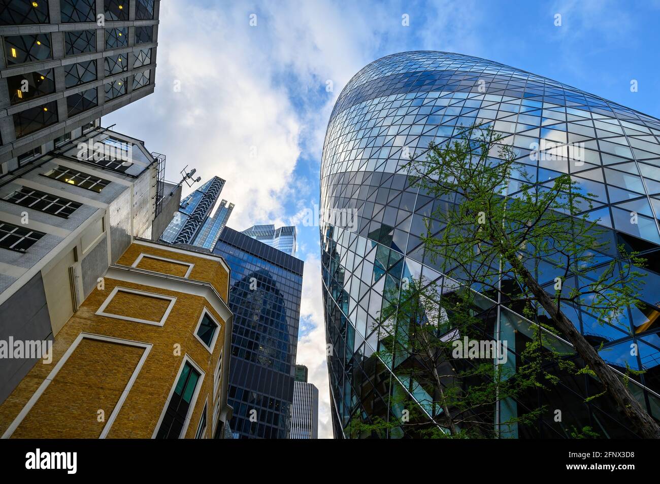 London, UK: Looking up at the Gherkin building in the City of London ...