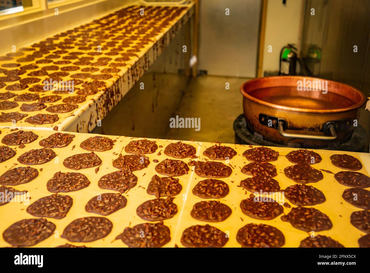 Production line of baking cookies in a small factory Stock Photo - Alamy