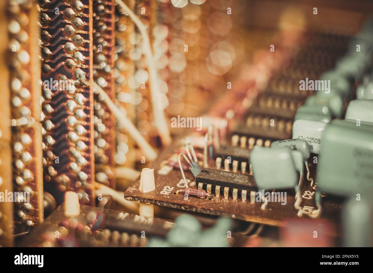 Vintage electronic circuit boards with radio parts and chips, close-up ...