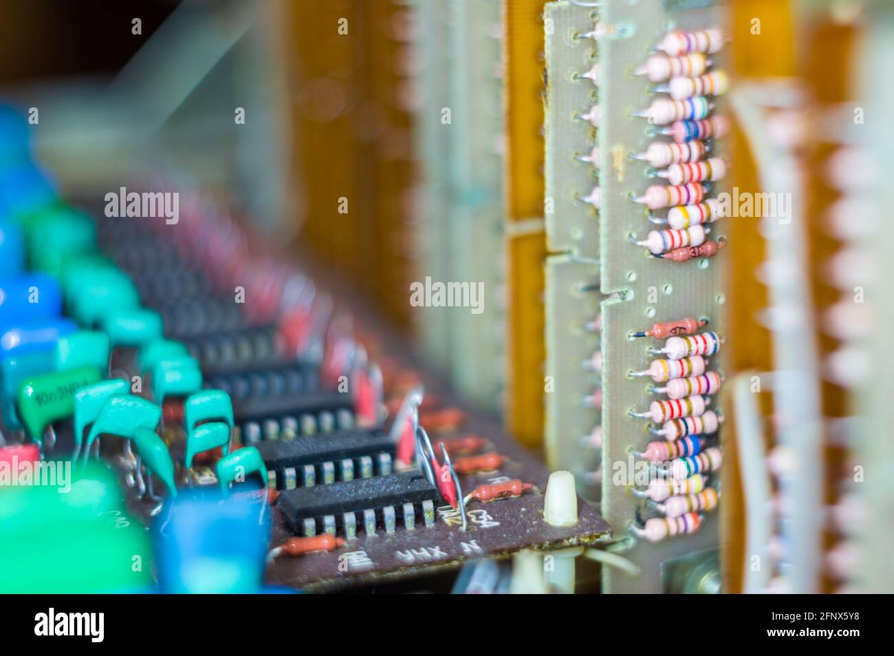 Vintage electronic circuit boards with radio parts and chips, close-up ...