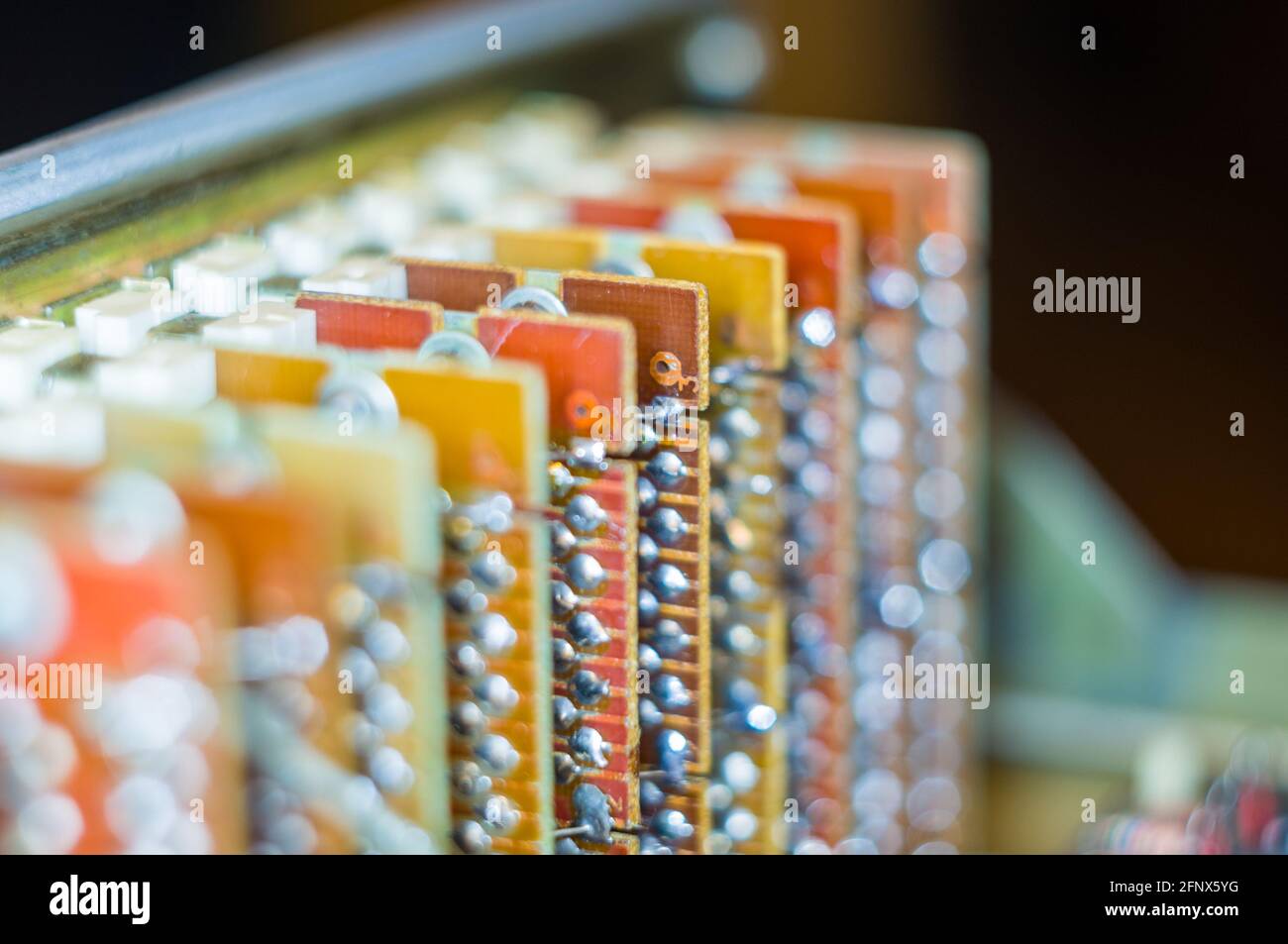 Vintage electronic circuit boards with radio parts and chips, close-up ...