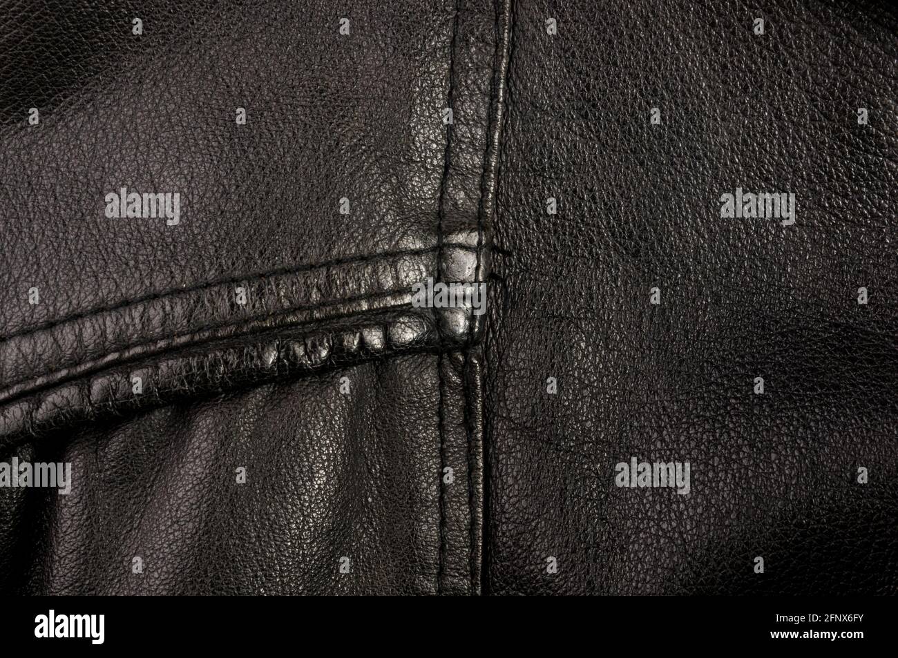 Old vintage genuine soft black leather texture background, top layer ...