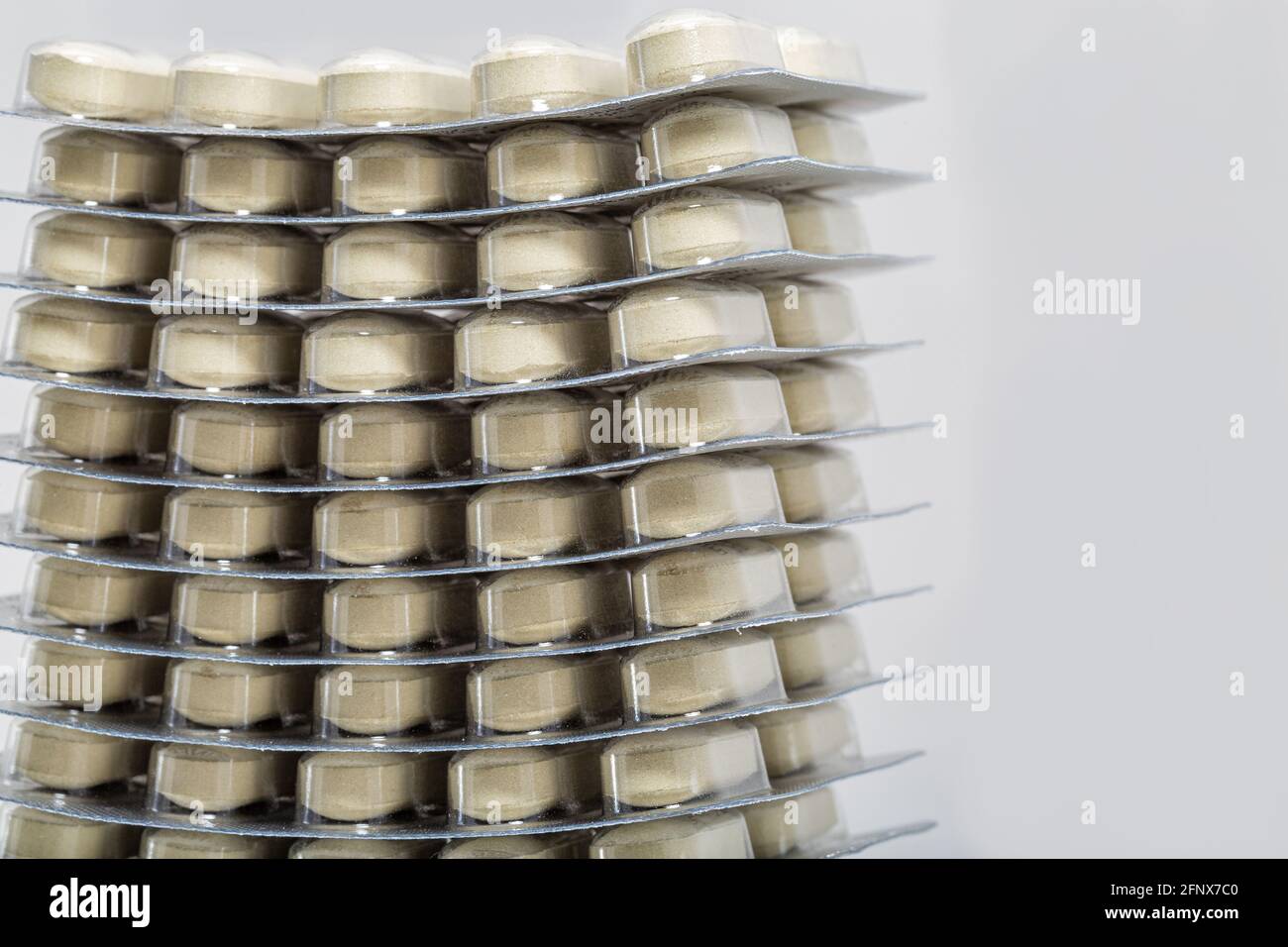 blisters with tablets closeup on white background Stock Photo - Alamy