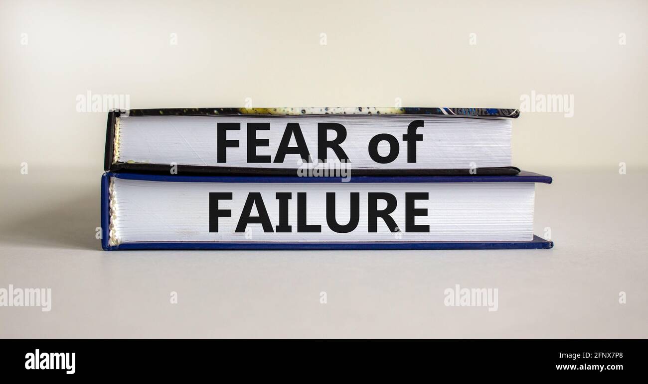 Fear of failure symbol. Books with words 'fear of failure'. Beautiful ...