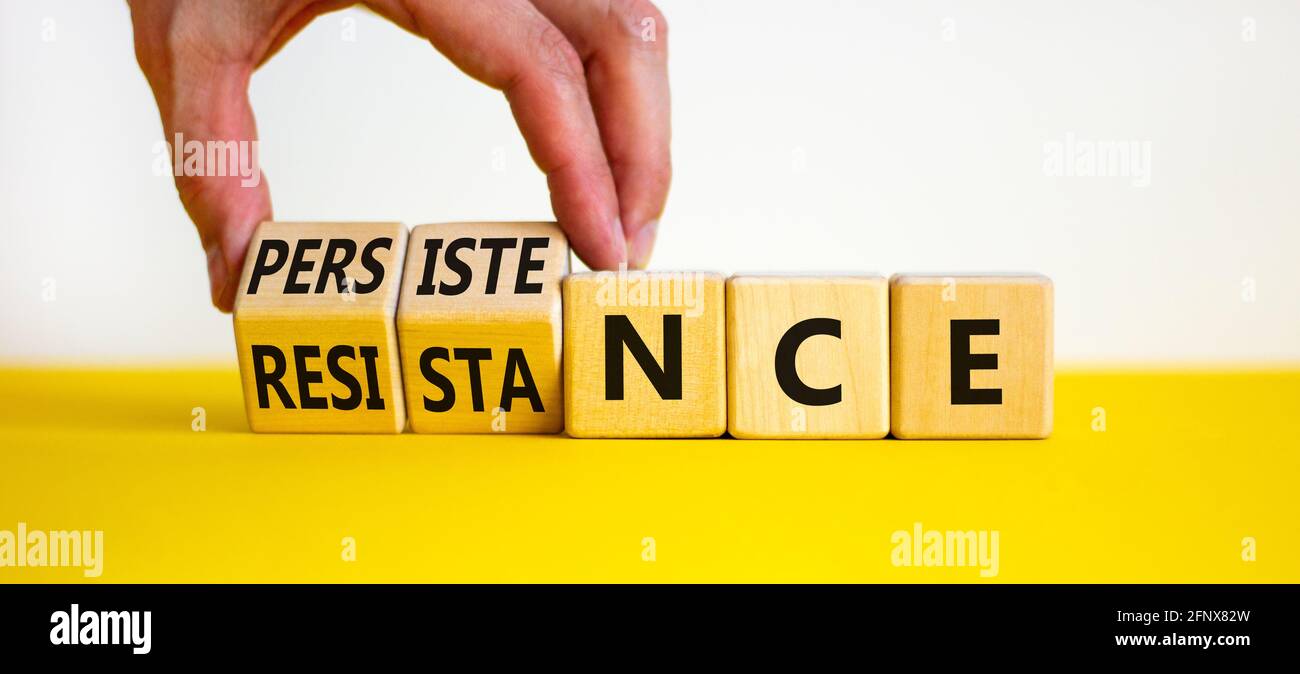 Persistence or resistance symbol. Businessman turns cubes, changes the ...
