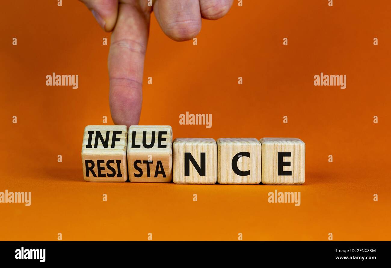 Influence or resistance symbol. Businessman turns cubes, changes the ...