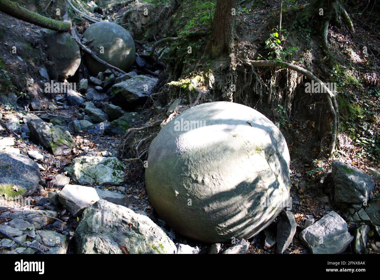 Stone sphere in a park in Bosnia and Herzegovina Stock Photo - Alamy