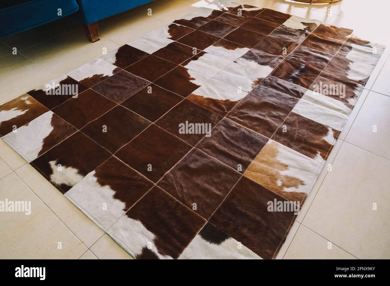handcrafted cowhide rug designed by country men Stock Photo - Alamy