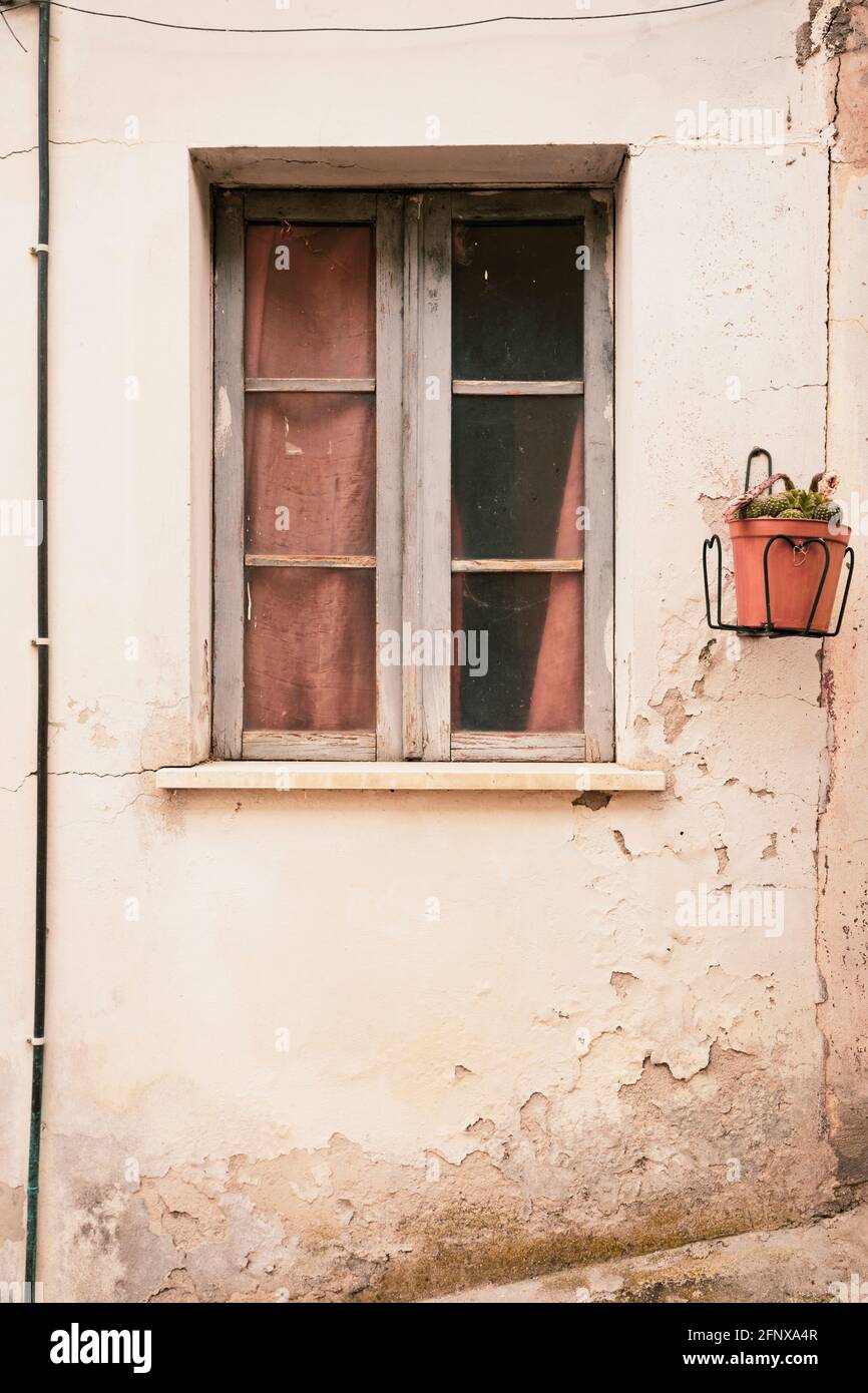 Front view of old window, house exterior Stock Photo - Alamy