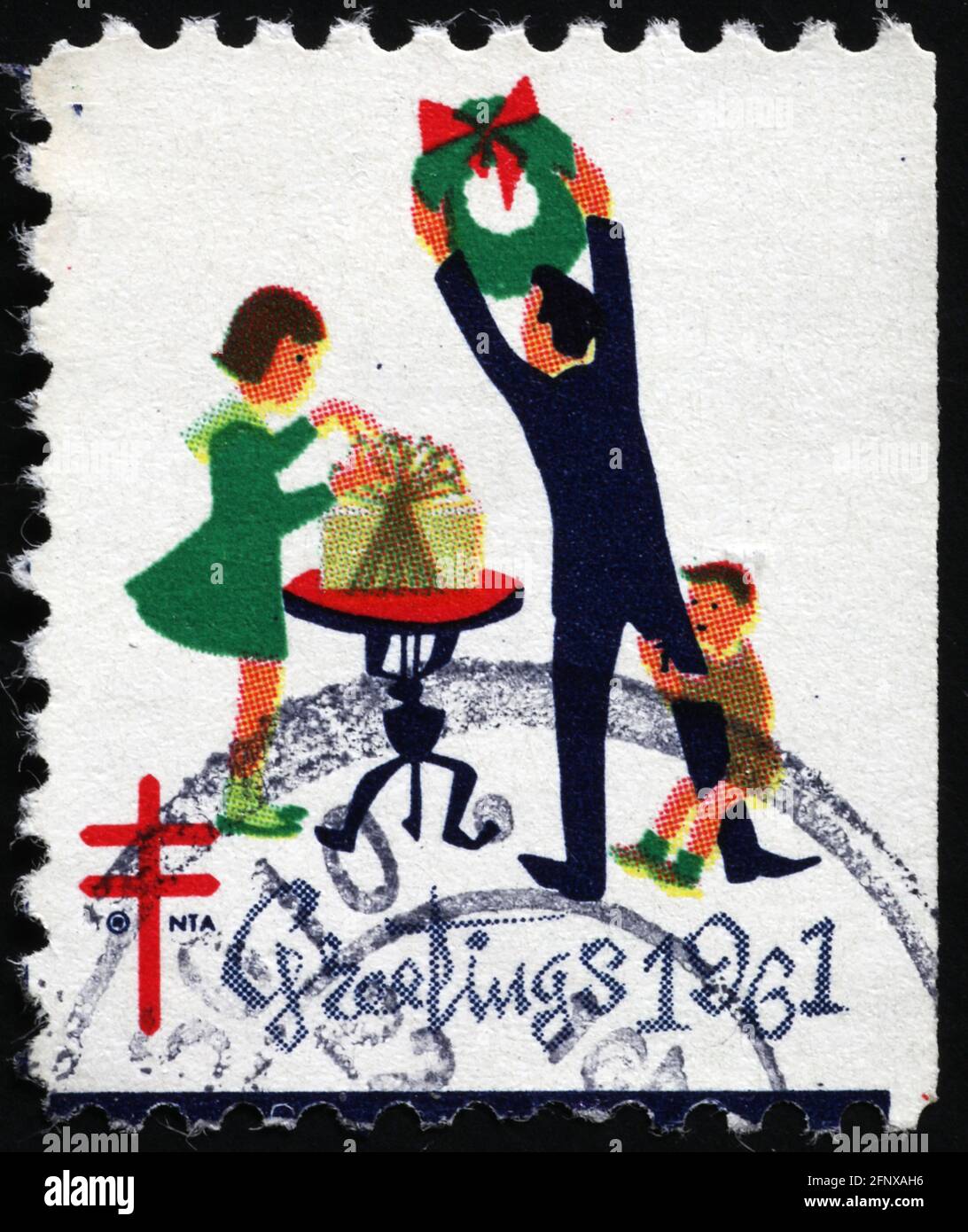 Christmas of 1961 celebrated on american stamp Stock Photo - Alamy