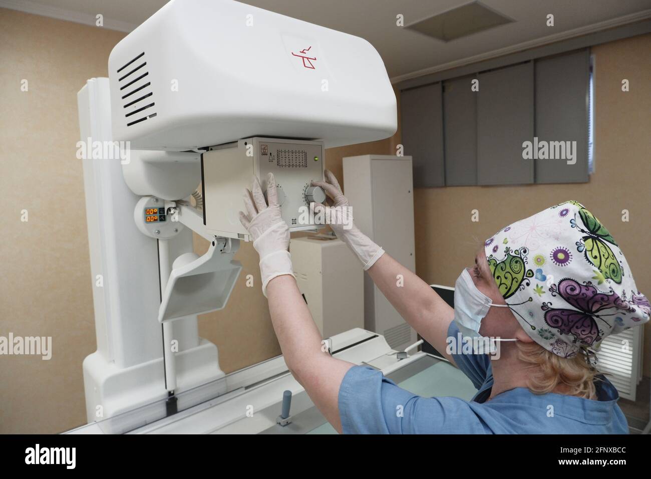 The work of a radiologist in the X-ray room for diagnostics Stock Photo ...