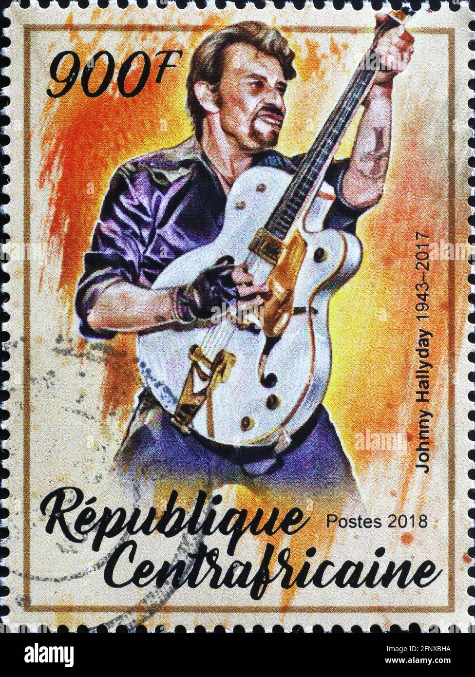 Johnny Hallyday in concert on postage stamp Stock Photo - Alamy