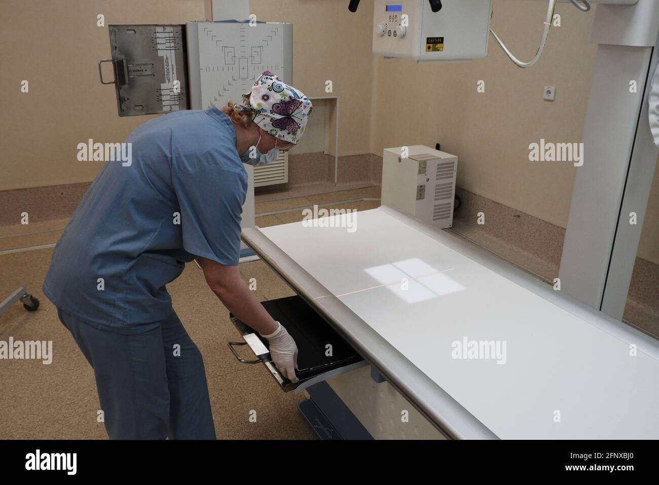 The work of a radiologist in the X-ray room for diagnostics Stock Photo ...