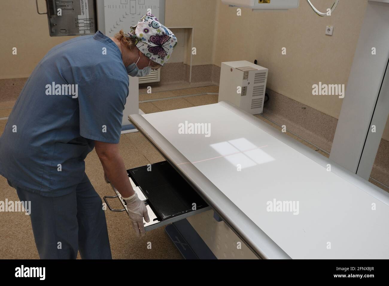 The work of a radiologist in the X-ray room for diagnostics Stock Photo ...