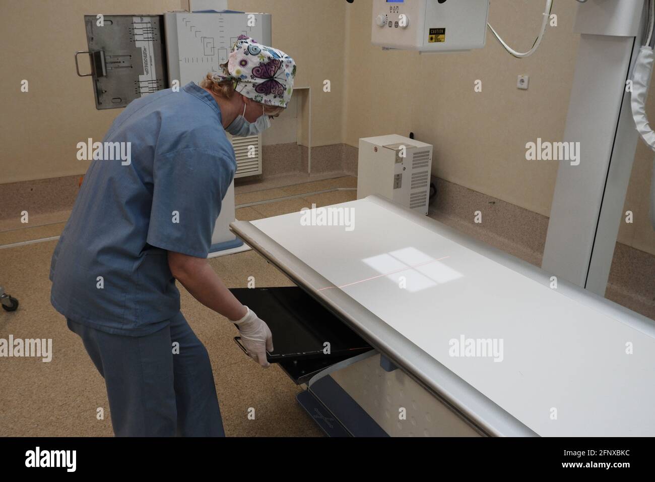 The work of a radiologist in the X-ray room for diagnostics Stock Photo ...
