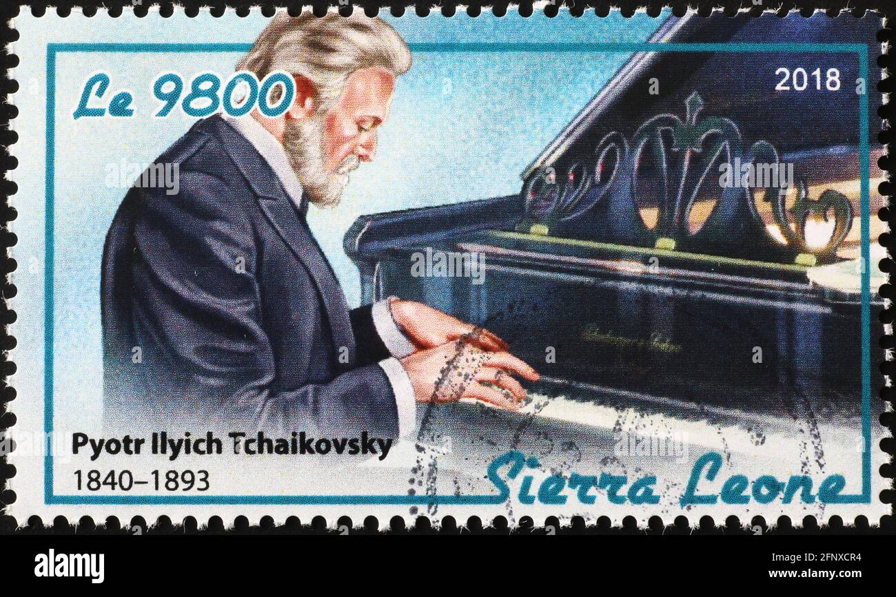 Tchaikovsky playing the piano on postage stamp Stock Photo - Alamy