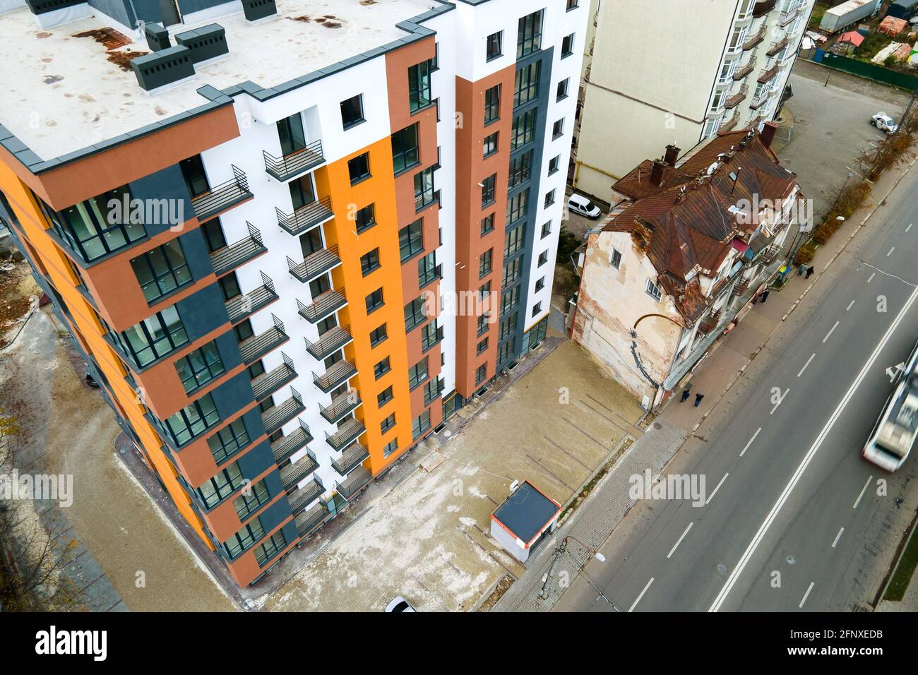 High rise apartment buildings and streets with traffic in city ...