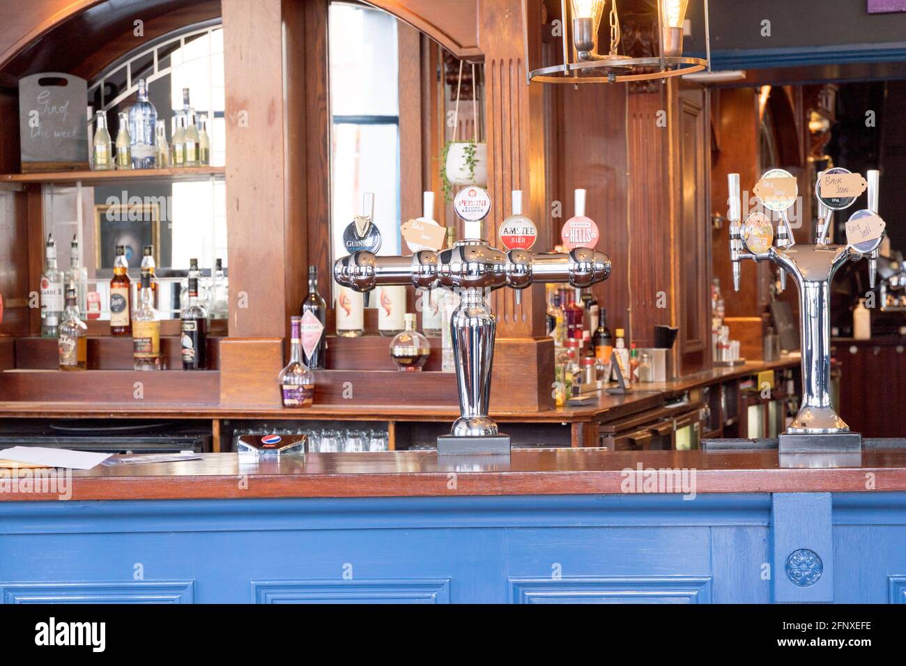 draught beer pump at the pub counter, interior view greenwich, London ...