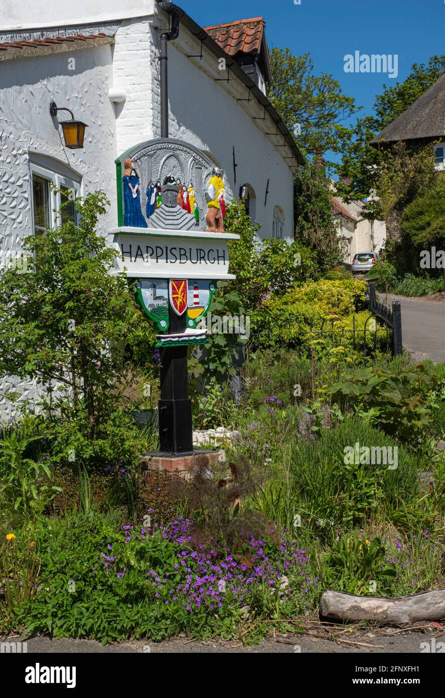 The freshly painted wooden village sign at Happisburgh on the Norfolk ...