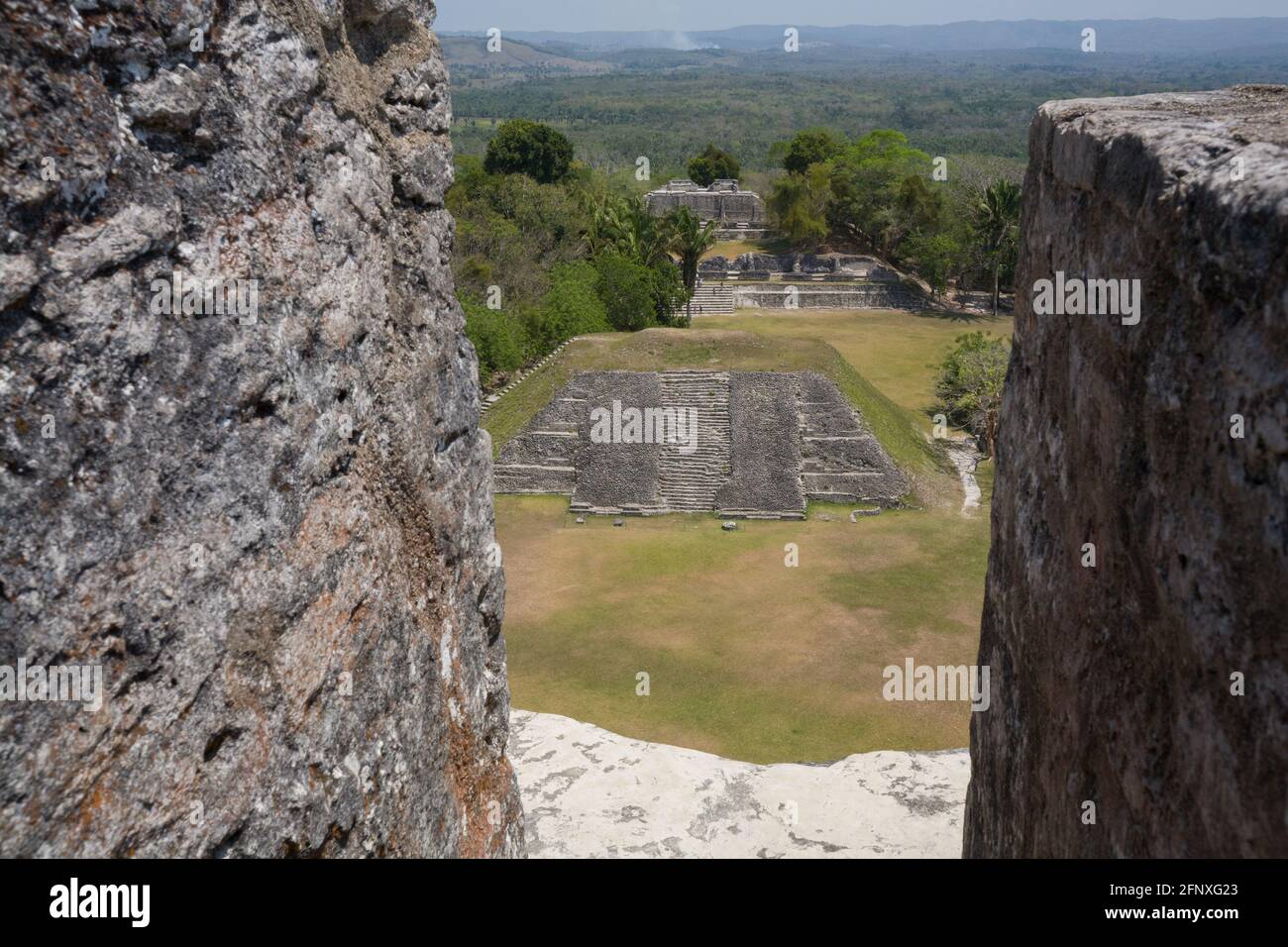 The main plaza seen from El Castillo at the Mayan ruins of Xunantunich ...