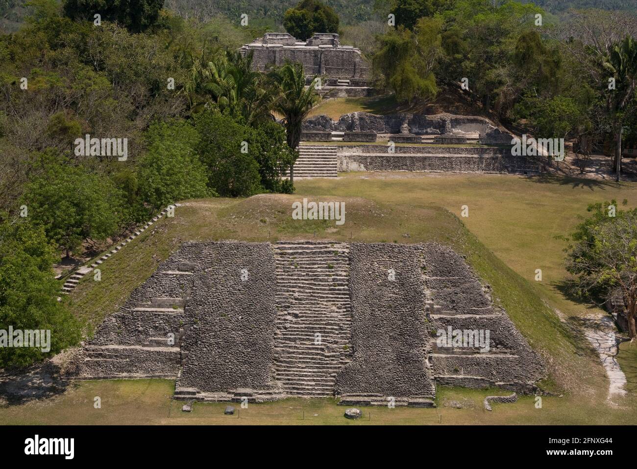 The main plaza seen from El Castillo at the Mayan ruins of Xunantunich ...
