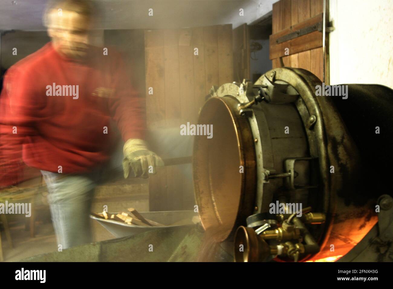 farmer distilling schnapps, Austria Stock Photo - Alamy