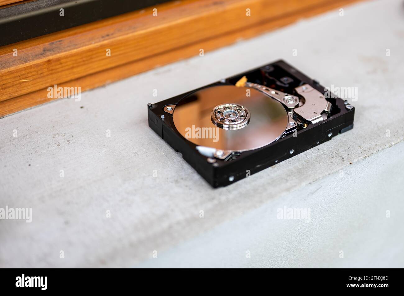 View on a hard disk drive on a concrete surface on a sunny day Stock ...