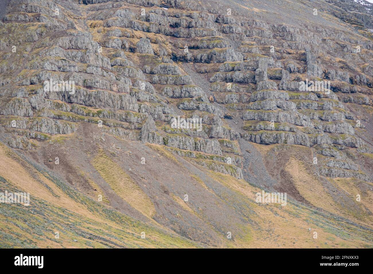 Close up of textures of Iceland mountain ridge green gray sand colors ...