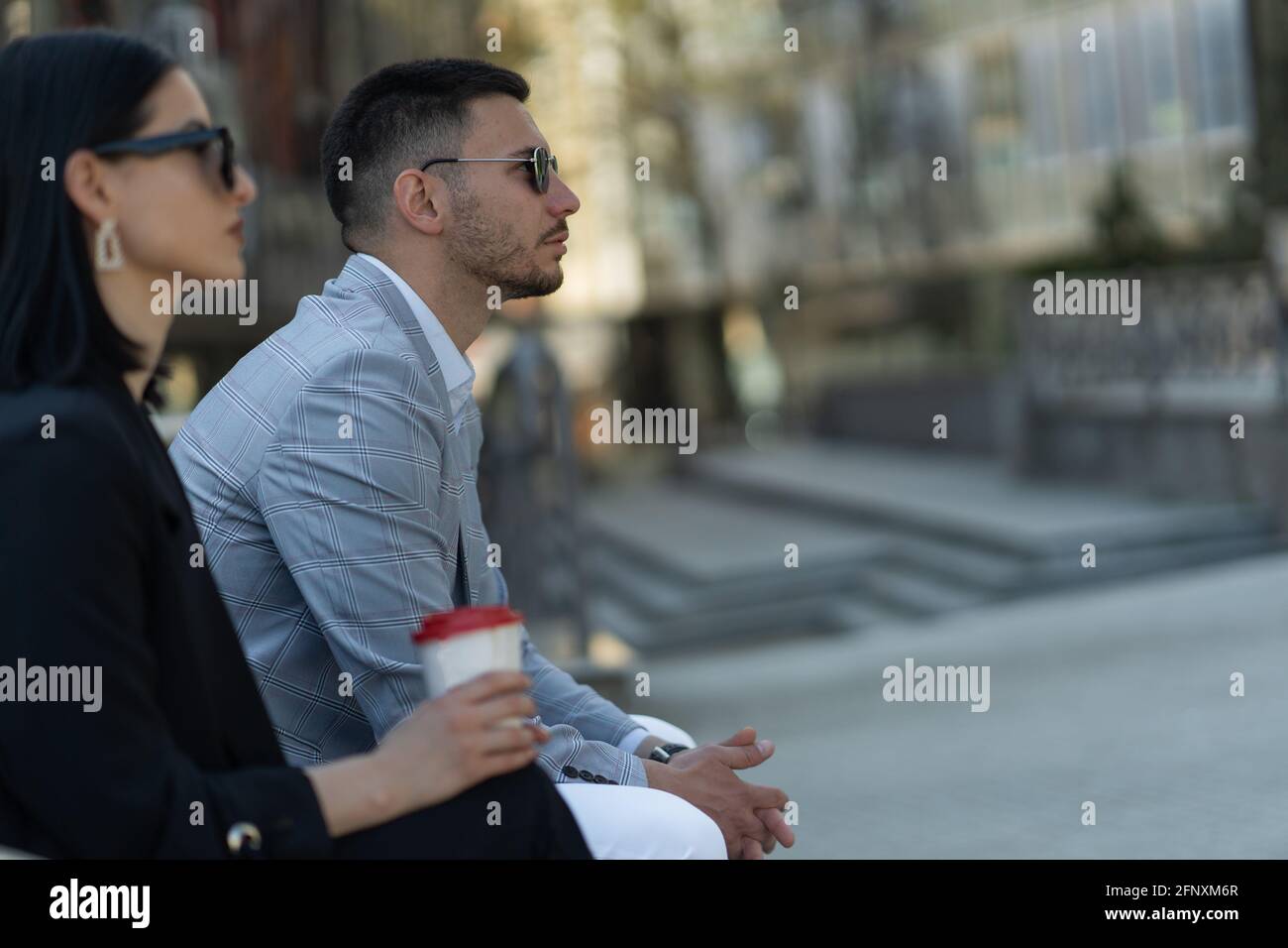 Two business partners are listening to the offer Stock Photo - Alamy