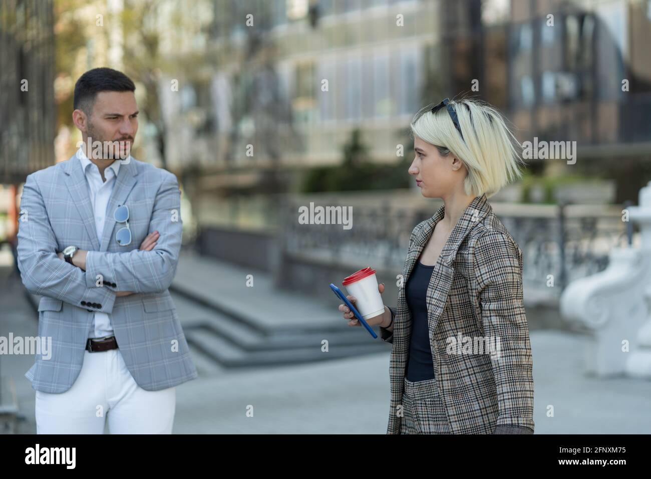 Two business partners are talking about the new plan Stock Photo - Alamy