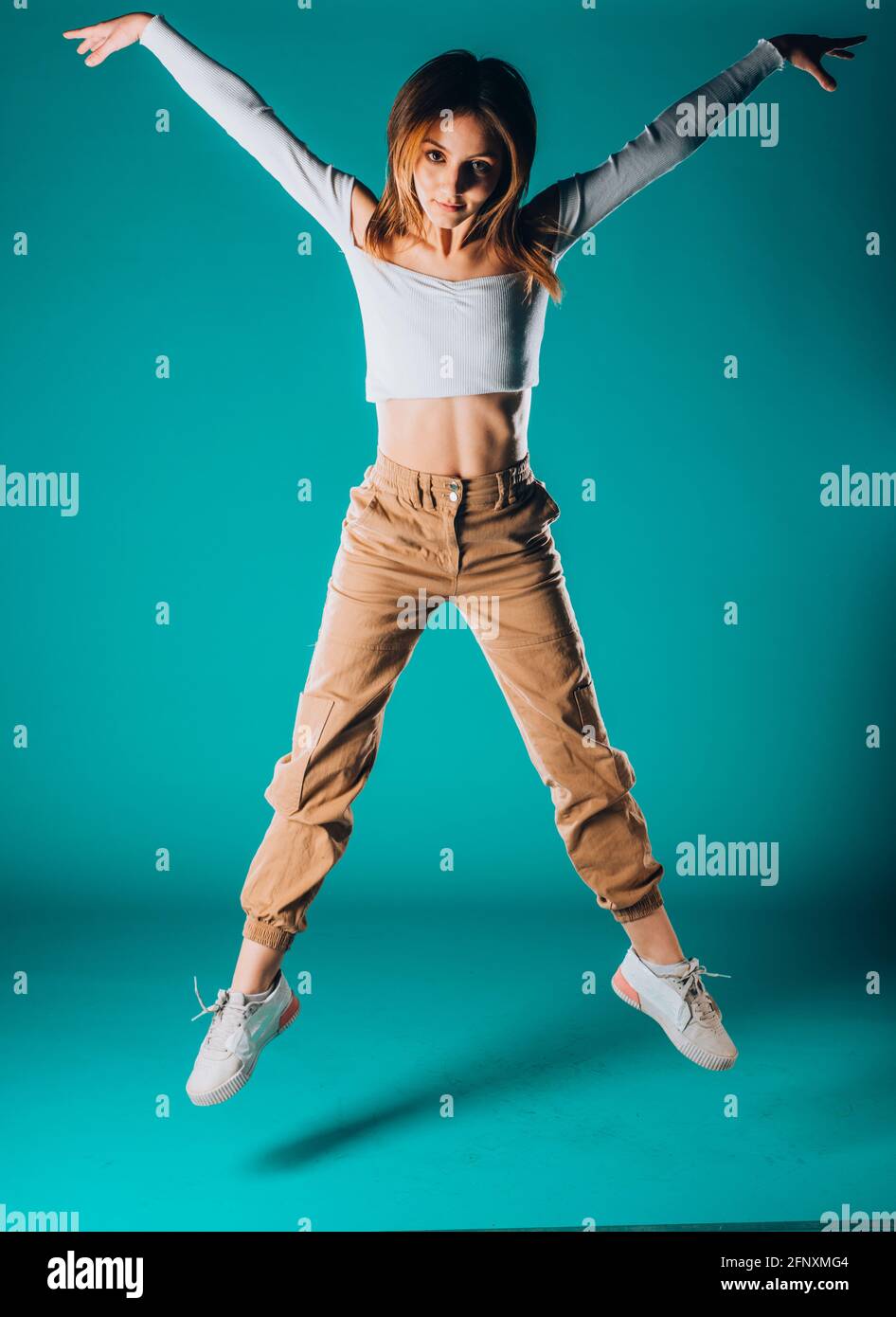Beautiful girl performing a contemporary dance routine Stock Photo - Alamy