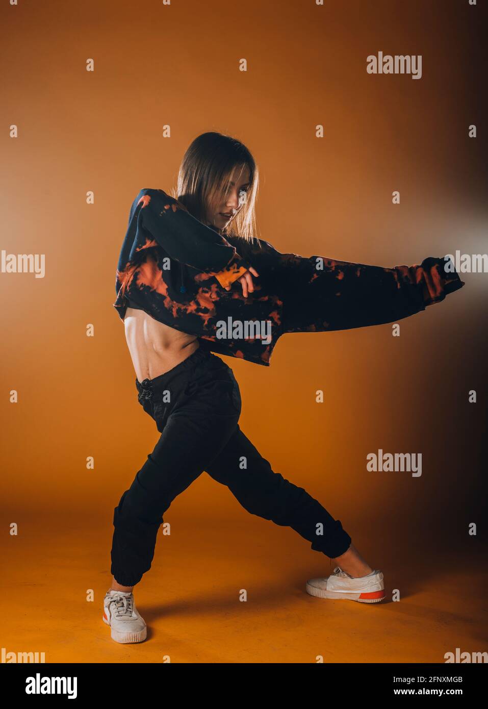 Modern dancing woman performing modern style dance moves Stock Photo ...