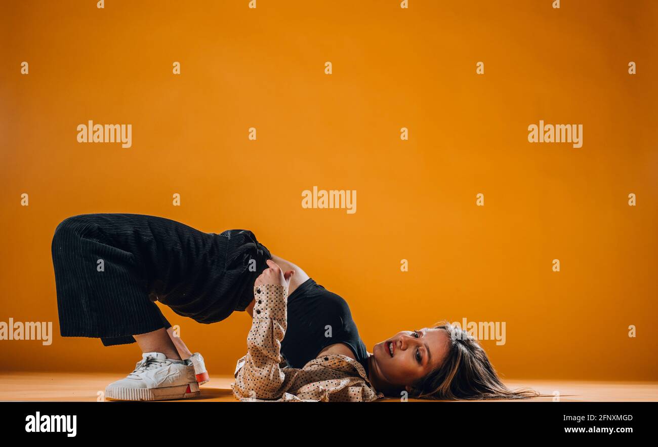 Modern dancing woman performing modern style dance moves Stock Photo ...