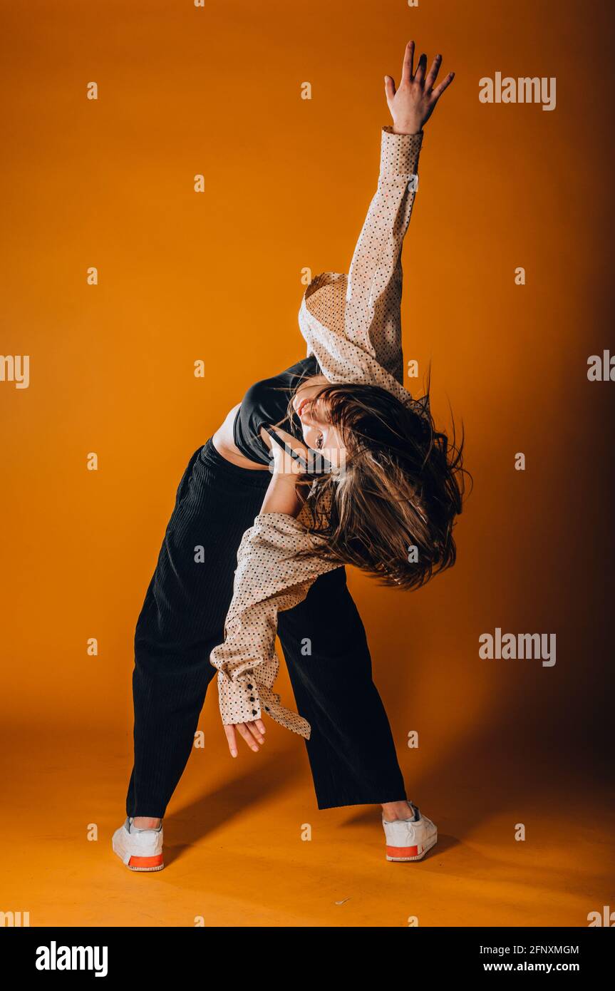 Contemporary dancing performer in a dance practice class Stock Photo ...