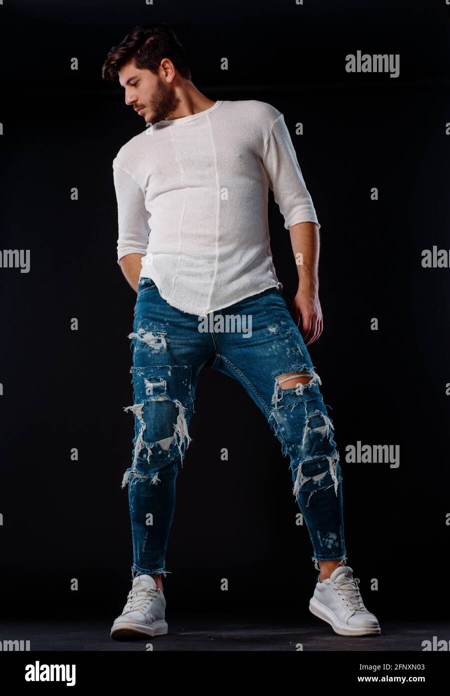 Attractive young male model posing in trendy stylish clothing Stock ...