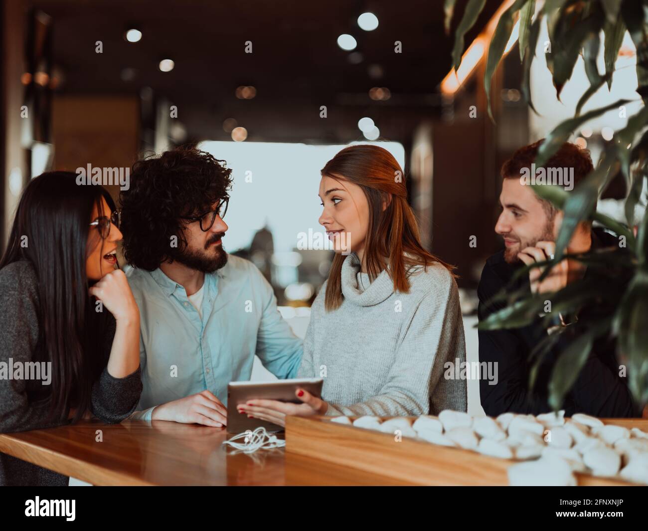 Cheerful professional male friends hanging hi-res stock photography and ...