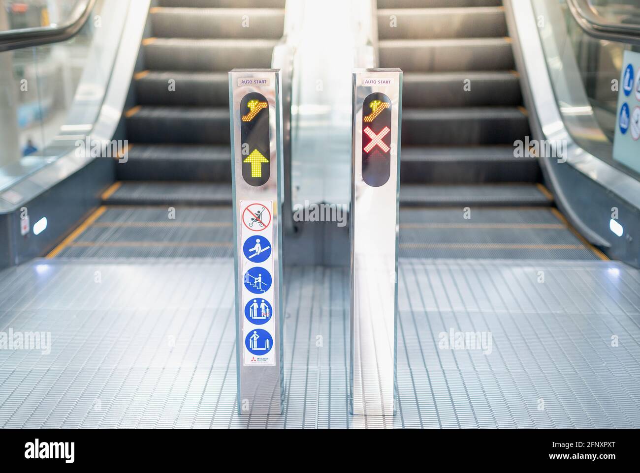 Escalator in modern building with the do not sign while use the ...